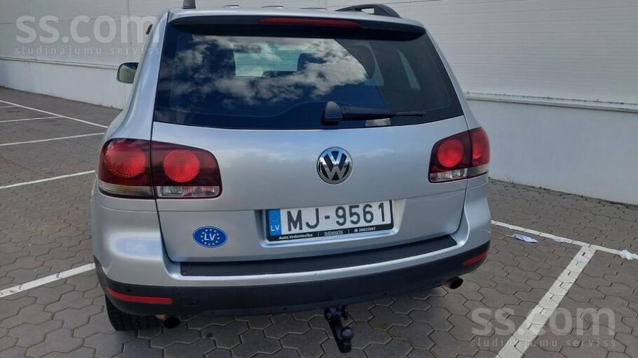 Grey Volkswagen Touareg 2009 in Riga, with an engine capacity of 3.00 L and mileage of 343 thousand km for 4990 €, photo 15 on AUTOMOTO.COM.LV