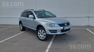 Grey Volkswagen Touareg 2009 in Riga, with an engine capacity of 3.00 L and mileage of 343 thousand km for 4990 €, photo 18 on AUTOMOTO.COM.LV