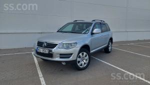 Grey Volkswagen Touareg 2009 in Riga, with an engine capacity of 3.00 L and mileage of 343 thousand km for 4990 €, photo 19 on AUTOMOTO.COM.LV