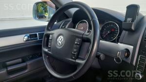 Grey Volkswagen Touareg 2009 in Riga, with an engine capacity of 3.00 L and mileage of 343 thousand km for 4990 €, photo 20 on AUTOMOTO.COM.LV