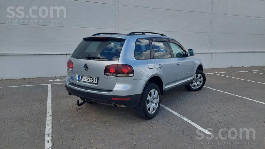 Grey Volkswagen Touareg 2009 in Riga, with an engine capacity of 3.00 L and mileage of 343 thousand km for 4990 €, photo 22 on AUTOMOTO.COM.LV