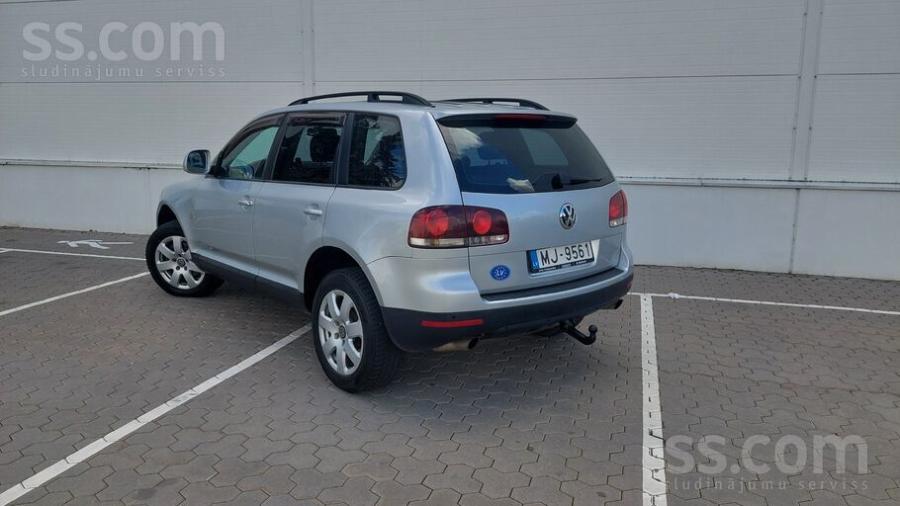 Grey Volkswagen Touareg 2009 in Riga, with an engine capacity of 3.00 L and mileage of 343 thousand km for 4990 €, photo 23 on AUTOMOTO.COM.LV