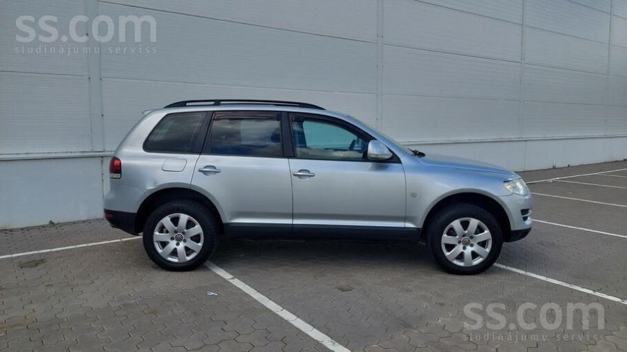 Grey Volkswagen Touareg 2009 in Riga, with an engine capacity of 3.00 L and mileage of 343 thousand km for 4990 €, photo 26 on AUTOMOTO.COM.LV