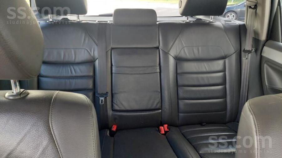 Grey Volkswagen Touareg 2009 in Riga, with an engine capacity of 3.00 L and mileage of 343 thousand km for 4990 €, photo 29 on AUTOMOTO.COM.LV