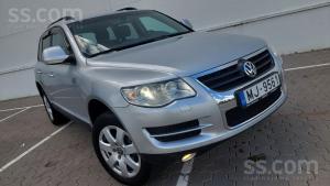 Grey Volkswagen Touareg 2009 in Riga, with an engine capacity of 3.00 L and mileage of 343 thousand km for 4990 €, photo 30 on AUTOMOTO.COM.LV