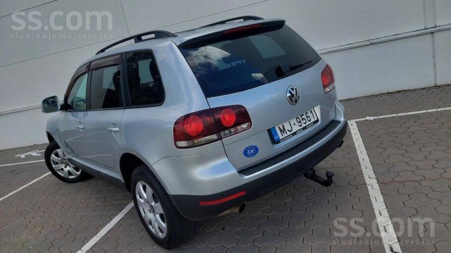 Grey Volkswagen Touareg 2009 in Riga, with an engine capacity of 3.00 L and mileage of 343 thousand km for 4990 €, photo 31 on AUTOMOTO.COM.LV