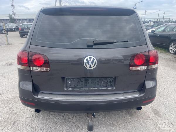 Grey Volkswagen Touareg 2009 in Kaunas, with an engine capacity of 3.00 L and mileage of 260 thousand km for 6999 €, photo 5 on AUTOMOTO.COM.LV