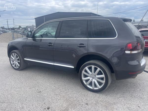 Grey Volkswagen Touareg 2009 in Kaunas, with an engine capacity of 3.00 L and mileage of 260 thousand km for 6999 €, photo 6 on AUTOMOTO.COM.LV