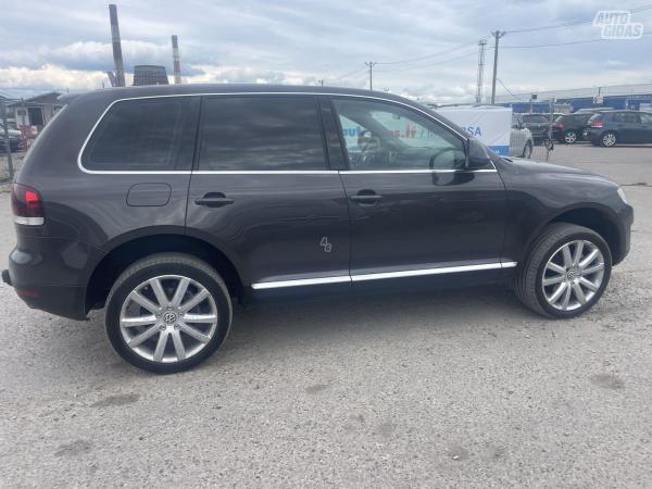 Grey Volkswagen Touareg 2009 in Kaunas, with an engine capacity of 3.00 L and mileage of 260 thousand km for 6999 €, photo 7 on AUTOMOTO.COM.LV