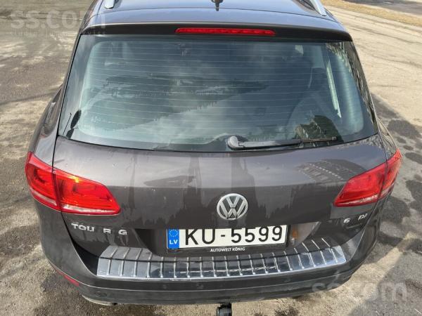 Pelēks Volkswagen Touareg 2010 Rīga, ar dzinēja tilpumu 3.00 L un nobraukumu 497 tūkst. km par 6000 €, foto 3 vietnē AUTOMOTO.COM.LV