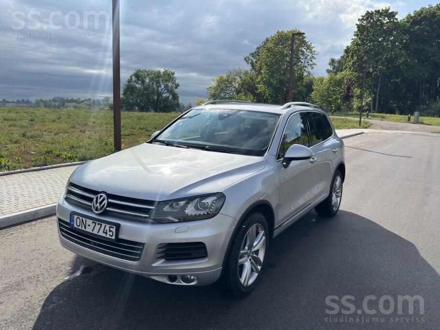 Pelēks Volkswagen Touareg 2010 Rēzekne, ar dzinēja tilpumu 3.00 L un nobraukumu 253 tūkst. km par 11990 €, foto 1 vietnē AUTOMOTO.COM.LV