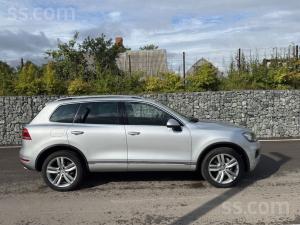 Pelēks Volkswagen Touareg 2010 Rēzekne, ar dzinēja tilpumu 3.00 L un nobraukumu 253 tūkst. km par 11990 €, foto 5 vietnē AUTOMOTO.COM.LV