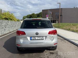 Pelēks Volkswagen Touareg 2010 Rēzekne, ar dzinēja tilpumu 3.00 L un nobraukumu 253 tūkst. km par 11990 €, foto 7 vietnē AUTOMOTO.COM.LV