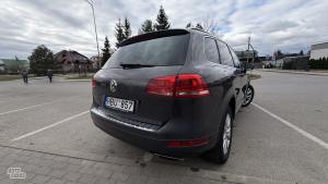 Grey Volkswagen Touareg 2011 in Vilnius, with an engine capacity of 3.00 L and mileage of 339 thousand km for 8000 €, photo 7 on AUTOMOTO.COM.LV