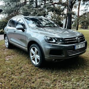 Grey Volkswagen Touareg 2011 in Rezekne, with an engine capacity of 3.00 L and mileage of 340 thousand km for 9900 €, photo  on AUTOMOTO.COM.LV