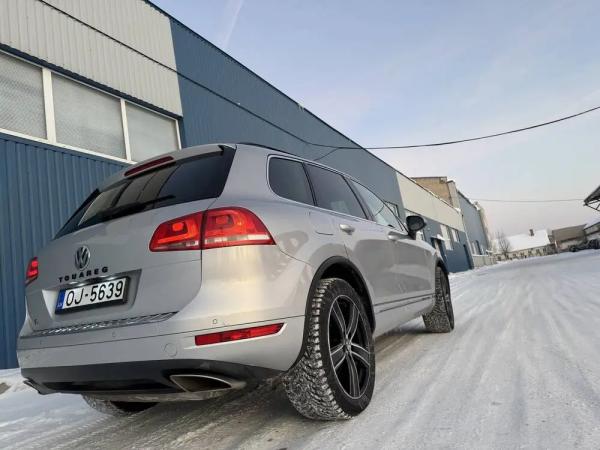 Grey Volkswagen Touareg 2011 in Rezekne, with an engine capacity of 3.00 L and mileage of 256 thousand km for 11500 €, photo 6 on AUTOMOTO.COM.LV