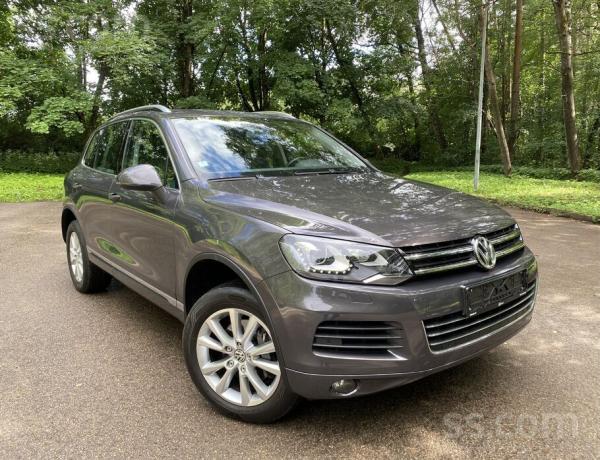 Grey Volkswagen Touareg 2011 in Riga, with an engine capacity of 3.00 L and mileage of 0 thousand km for 11700 €, photo 1 on AUTOMOTO.COM.LV