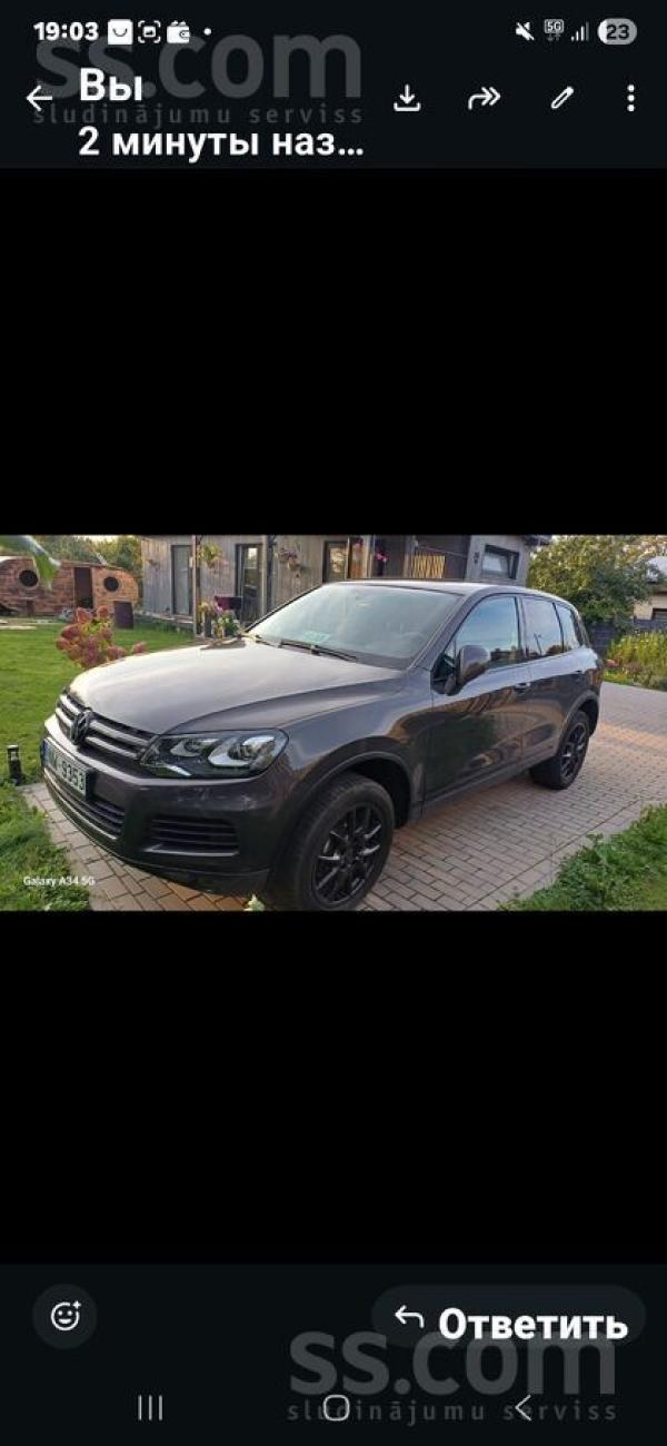 Grey Volkswagen Touareg 2011 in Riga, with an engine capacity of 3.00 L and mileage of 295 thousand km for 10700 €, photo 2 on AUTOMOTO.COM.LV