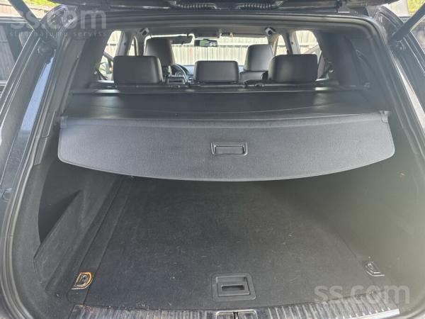 Grey Volkswagen Touareg 2011 in Riga, with an engine capacity of 3.00 L and mileage of 295 thousand km for 10700 €, photo 8 on AUTOMOTO.COM.LV