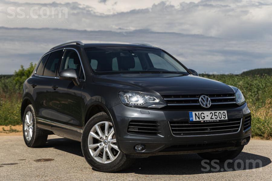 Grey Volkswagen Touareg 2011 in Riga, with an engine capacity of 3.00 L and mileage of 278 thousand km for 9000 €, photo 4 on AUTOMOTO.COM.LV