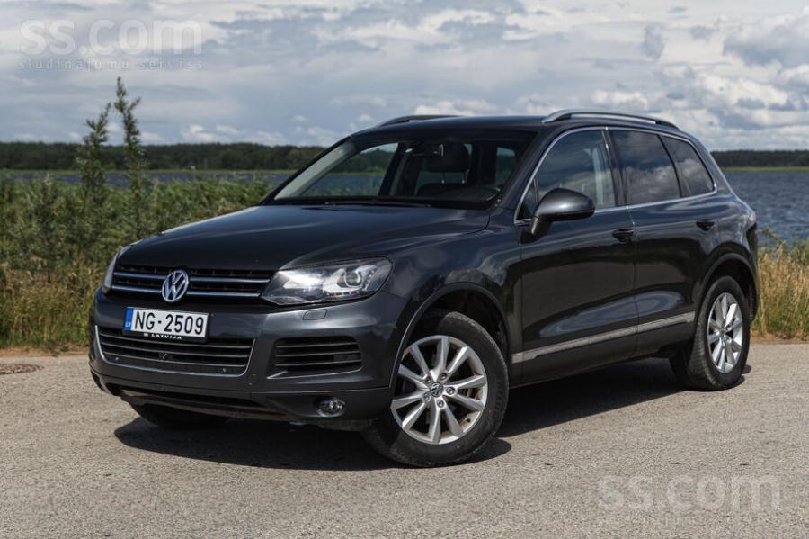 Grey Volkswagen Touareg 2011 in Riga, with an engine capacity of 3.00 L and mileage of 278 thousand km for 9000 €, photo 7 on AUTOMOTO.COM.LV