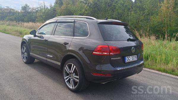 Pelēks Volkswagen Touareg 2011 Jelgava, ar dzinēja tilpumu 3.00 L un nobraukumu 206 tūkst. km par 12100 €, foto 1 vietnē AUTOMOTO.COM.LV