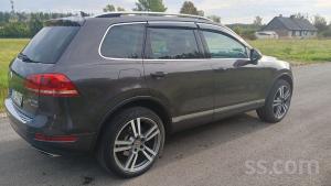 Grey Volkswagen Touareg 2011 in Jelgava, with an engine capacity of 3.00 L and mileage of 206 thousand km for 12100 €, photo 3 on AUTOMOTO.COM.LV