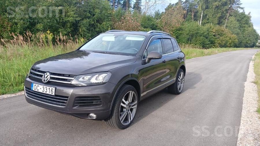 Grey Volkswagen Touareg 2011 in Jelgava, with an engine capacity of 3.00 L and mileage of 206 thousand km for 12100 €, photo 9 on AUTOMOTO.COM.LV
