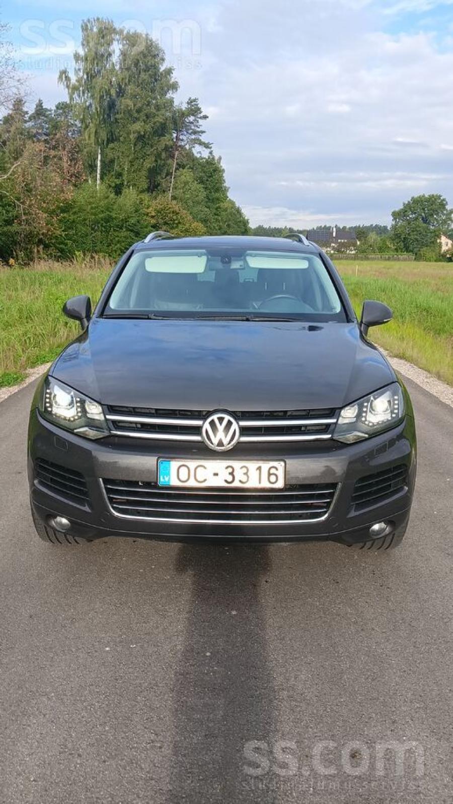 Grey Volkswagen Touareg 2011 in Jelgava, with an engine capacity of 3.00 L and mileage of 206 thousand km for 12100 €, photo 10 on AUTOMOTO.COM.LV