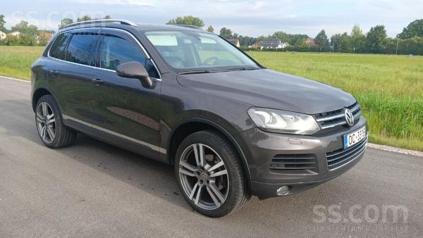 Pelēks Volkswagen Touareg 2011 Jelgava, ar dzinēja tilpumu 3.00 L un nobraukumu 206 tūkst. km par 12100 €, foto 11 vietnē AUTOMOTO.COM.LV