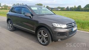 Grey Volkswagen Touareg 2011 in Jelgava, with an engine capacity of 3.00 L and mileage of 206 thousand km for 12100 €, photo 11 on AUTOMOTO.COM.LV