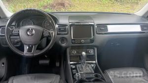 Grey Volkswagen Touareg 2011 in Jelgava, with an engine capacity of 3.00 L and mileage of 206 thousand km for 12100 €, photo 22 on AUTOMOTO.COM.LV