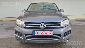 Grey Volkswagen Touareg 2011 in Ogre, with an engine capacity of 3.00 L and mileage of 278 thousand km for 11250 €, photo 4 on AUTOMOTO.COM.LV