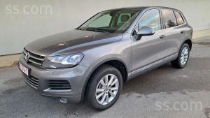 Grey Volkswagen Touareg 2011 in Ogre, with an engine capacity of 3.00 L and mileage of 278 thousand km for 11250 €, photo 6 on AUTOMOTO.COM.LV
