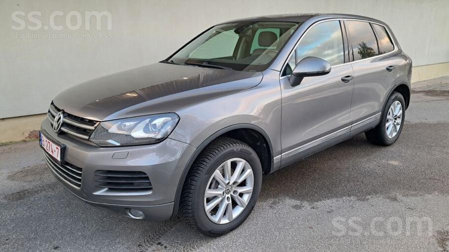 Grey Volkswagen Touareg 2011 in Ogre, with an engine capacity of 3.00 L and mileage of 278 thousand km for 11250 €, photo 6 on AUTOMOTO.COM.LV