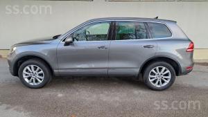 Grey Volkswagen Touareg 2011 in Ogre, with an engine capacity of 3.00 L and mileage of 278 thousand km for 11250 €, photo 9 on AUTOMOTO.COM.LV
