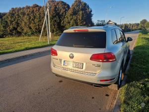 Grey Volkswagen Touareg 2011 in Taurage, with an engine capacity of 3.00 L and mileage of 360 thousand km for 12000 €, photo 5 on AUTOMOTO.COM.LV
