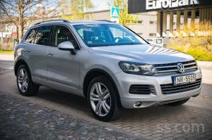 Grey Volkswagen Touareg 2012 in Riga, with an engine capacity of 3.00 L and mileage of 0 thousand km for 34990 €, photo 3 on AUTOMOTO.COM.LV