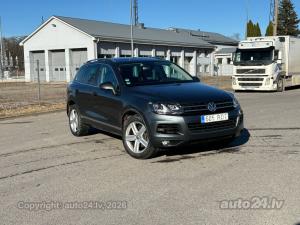 Pelēks Volkswagen Touareg 2012 Mustvē, ar dzinēja tilpumu 3.00 L un nobraukumu 286 tūkst. km par 7499 €, foto  vietnē AUTOMOTO.COM.LV