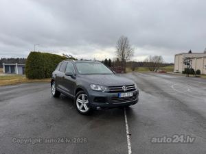 Pelēks Volkswagen Touareg 2012 Mustvē, ar dzinēja tilpumu 3.00 L un nobraukumu 284 tūkst. km par 7499 €, foto  vietnē AUTOMOTO.COM.LV