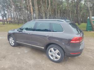 Pelēks Volkswagen Touareg 2012 Klaipėda, ar dzinēja tilpumu 3.00 L un nobraukumu 225 tūkst. km par 10000 €, foto  vietnē AUTOMOTO.COM.LV