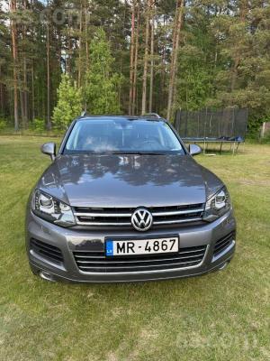 Grey Volkswagen Touareg 2012 in Riga, with an engine capacity of 3.00 L and mileage of 268 thousand km for 11000 €, photo  on AUTOMOTO.COM.LV