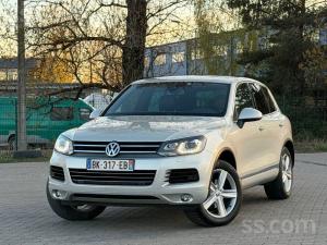 Pelēks Volkswagen Touareg 2012 Rīga, ar dzinēja tilpumu 3.00 L un nobraukumu 0 tūkst. km par 8450 €, foto  vietnē AUTOMOTO.COM.LV