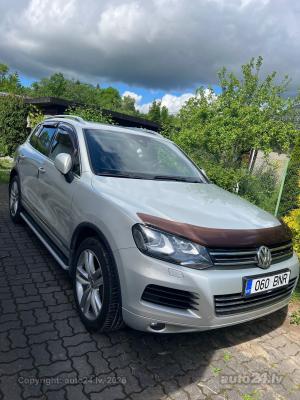 Pelēks Volkswagen Touareg 2012 Tallina, ar dzinēja tilpumu 3.00 L un nobraukumu 196 tūkst. km par 13900 €, foto  vietnē AUTOMOTO.COM.LV