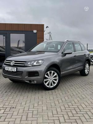 Grey Volkswagen Touareg 2012 in Kaunas, with an engine capacity of 2.97 L and mileage of 353 thousand km for 9700 €, photo  on AUTOMOTO.COM.LV