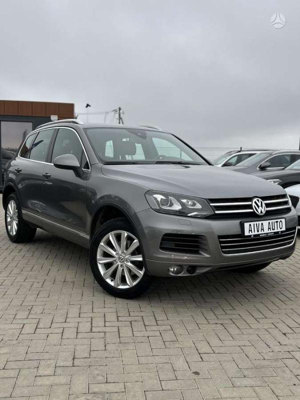 Grey Volkswagen Touareg 2012 in Kaunas, with an engine capacity of 2.97 L and mileage of 353 thousand km for 9700 €, photo 6 on AUTOMOTO.COM.LV