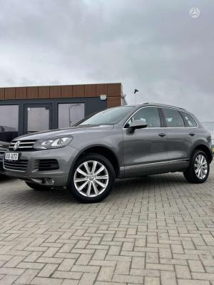 Grey Volkswagen Touareg 2012 in Kaunas, with an engine capacity of 2.97 L and mileage of 353 thousand km for 9700 €, photo 15 on AUTOMOTO.COM.LV