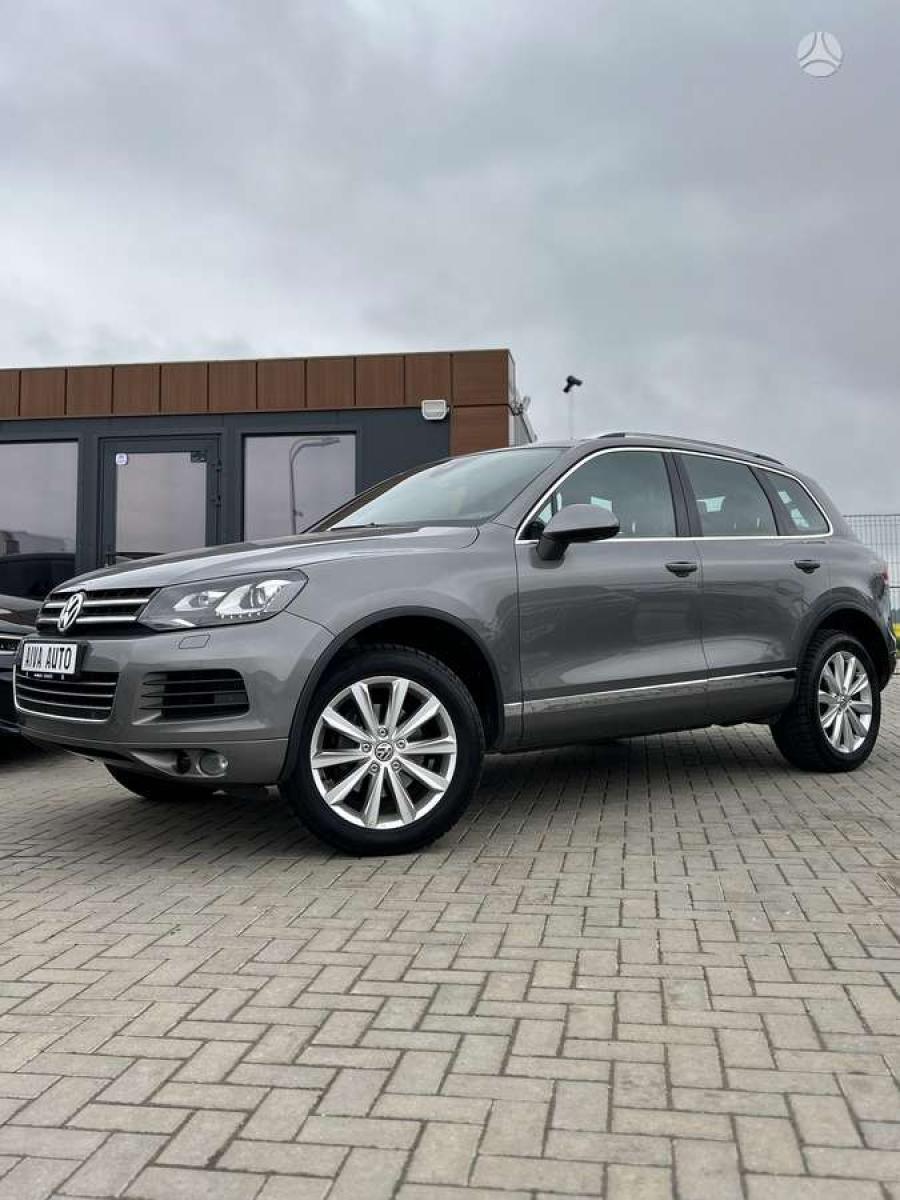 Grey Volkswagen Touareg 2012 in Kaunas, with an engine capacity of 2.97 L and mileage of 353 thousand km for 9700 €, photo 15 on AUTOMOTO.COM.LV
