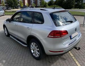 Grey Volkswagen Touareg 2012 in Vilnius, with an engine capacity of 2.97 L and mileage of 410 thousand km for 5999 €, photo 5 on AUTOMOTO.COM.LV
