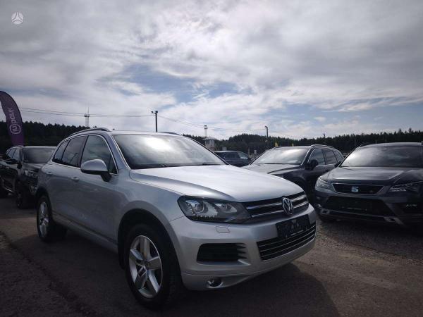 Grey Volkswagen Touareg 2012 in Vilnius, with an engine capacity of 3.00 L and mileage of 234 thousand km for 11950 €, photo 4 on AUTOMOTO.COM.LV